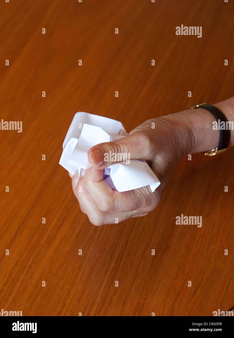 Scrunched paper in hand hi-res stock photography and images - Alamy