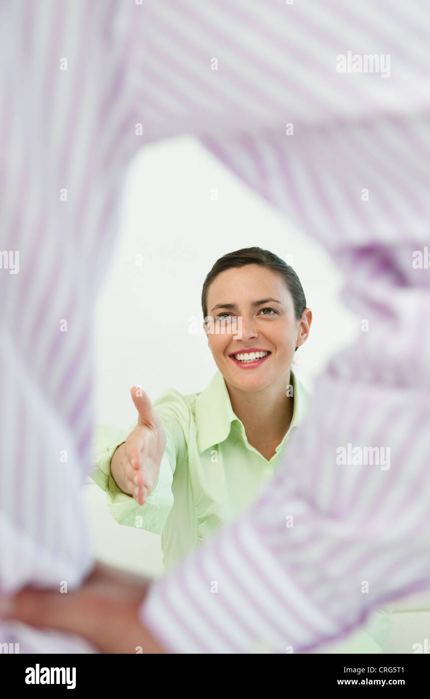 Extending hands arms hi-res stock photography and images - Alamy