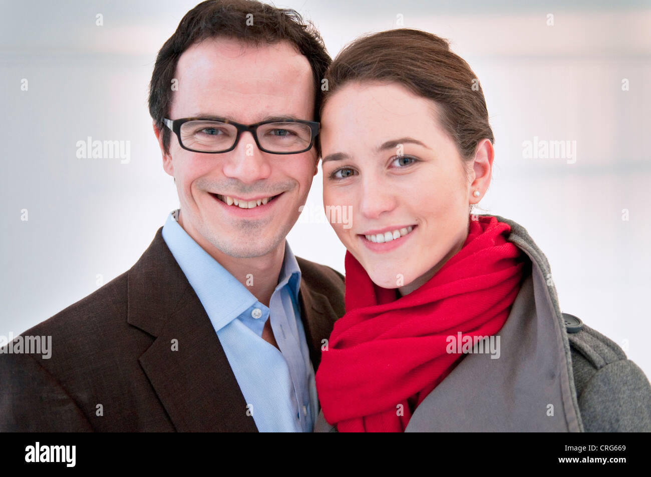 Smiling couple hugging Stock Photo - Alamy