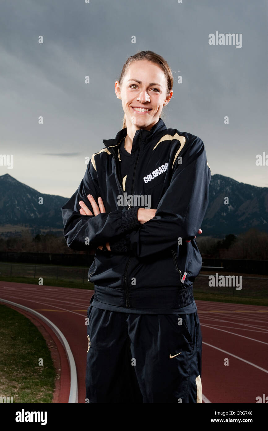 A portrait of a female athlete posing on a track Stock Photo - Alamy