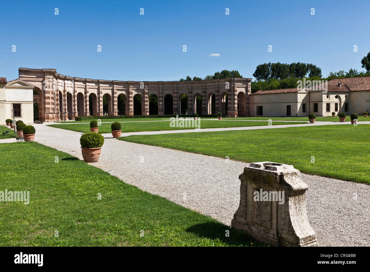 Colonnade with manicured gardens Stock Photo - Alamy