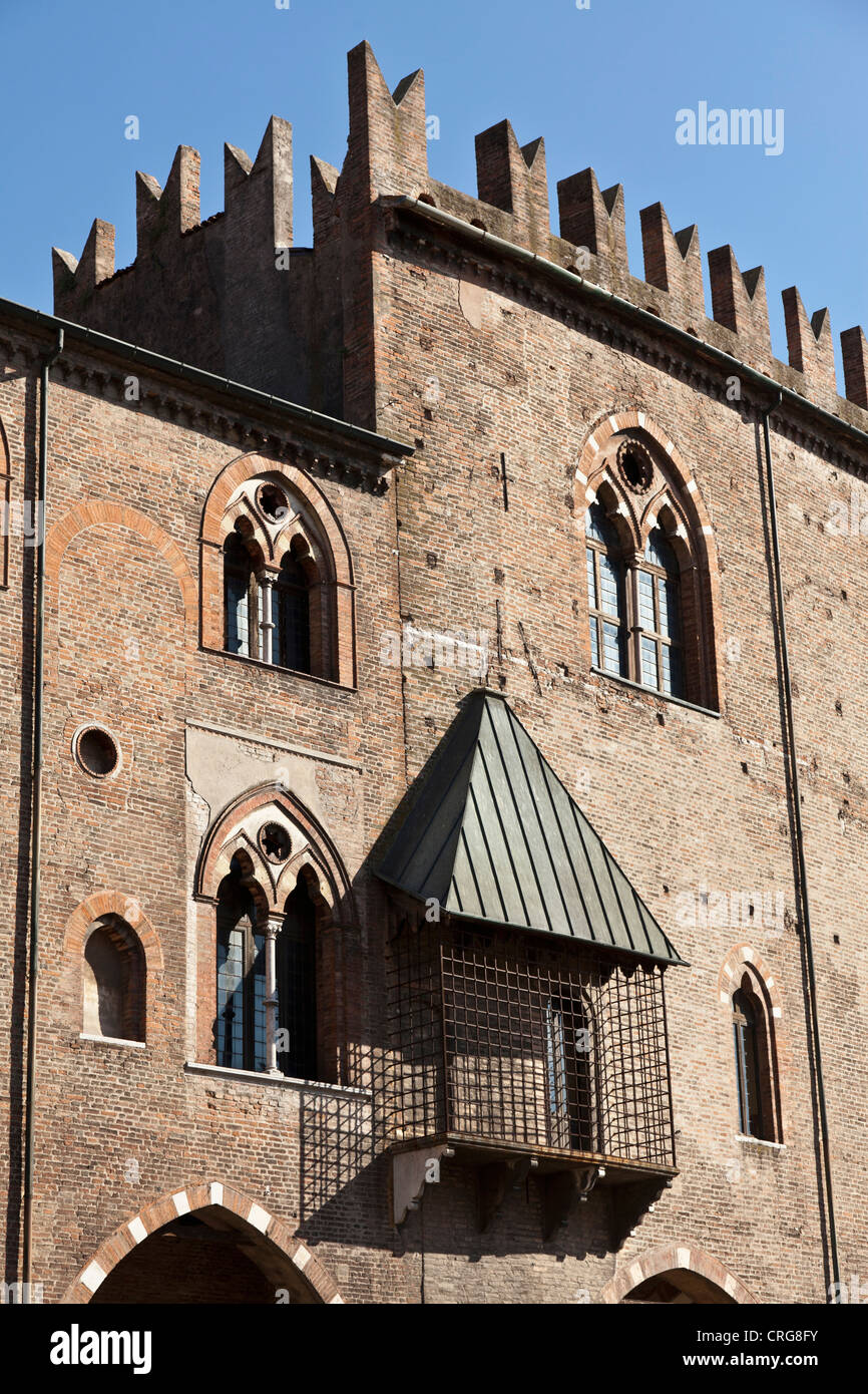 Ornate windows on brick building Stock Photo - Alamy