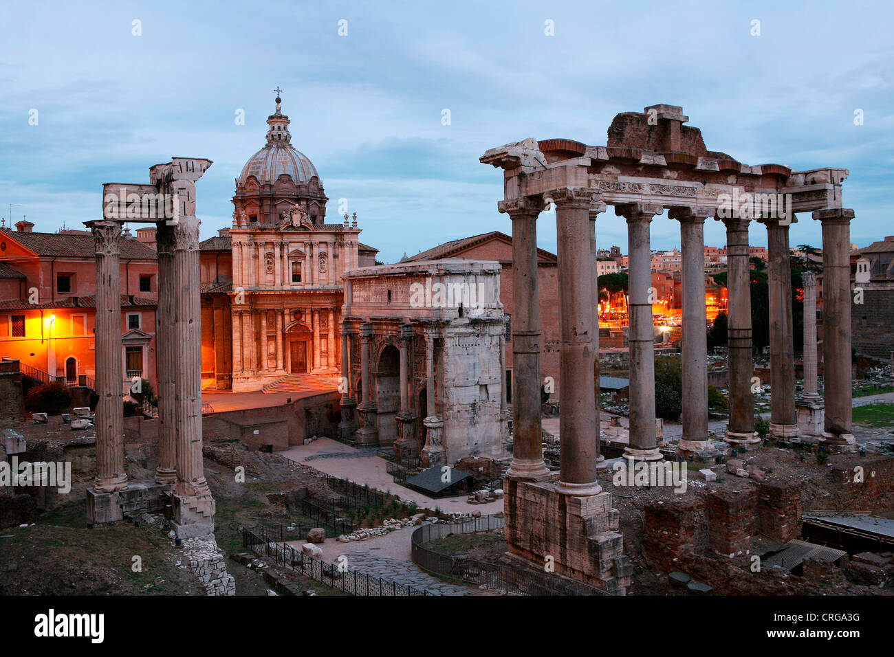 The ancient structure of Trajan's Forum at dusk Stock Photo - Alamy