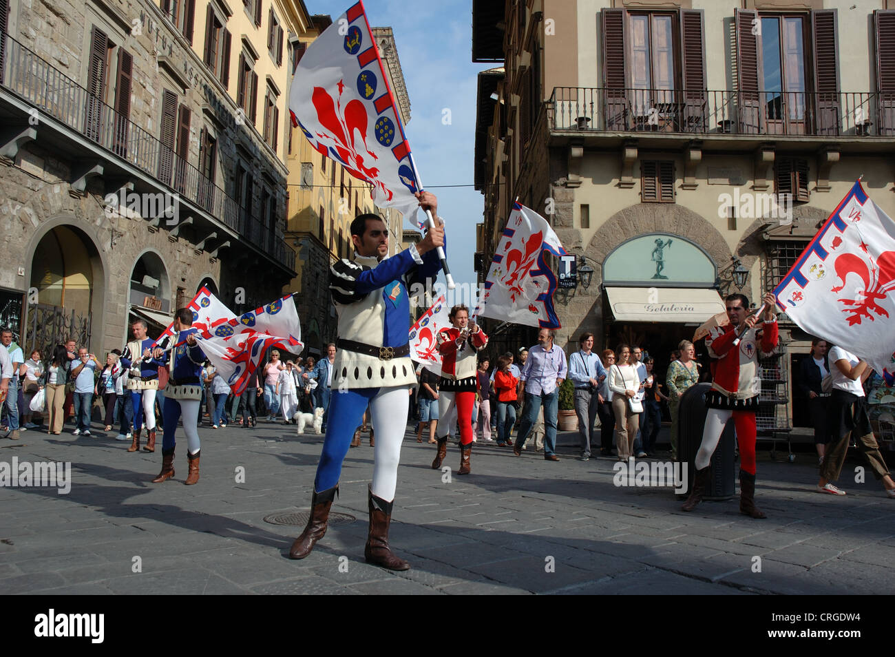 Flag throwers put on a colourful display in the streets of Florence ...