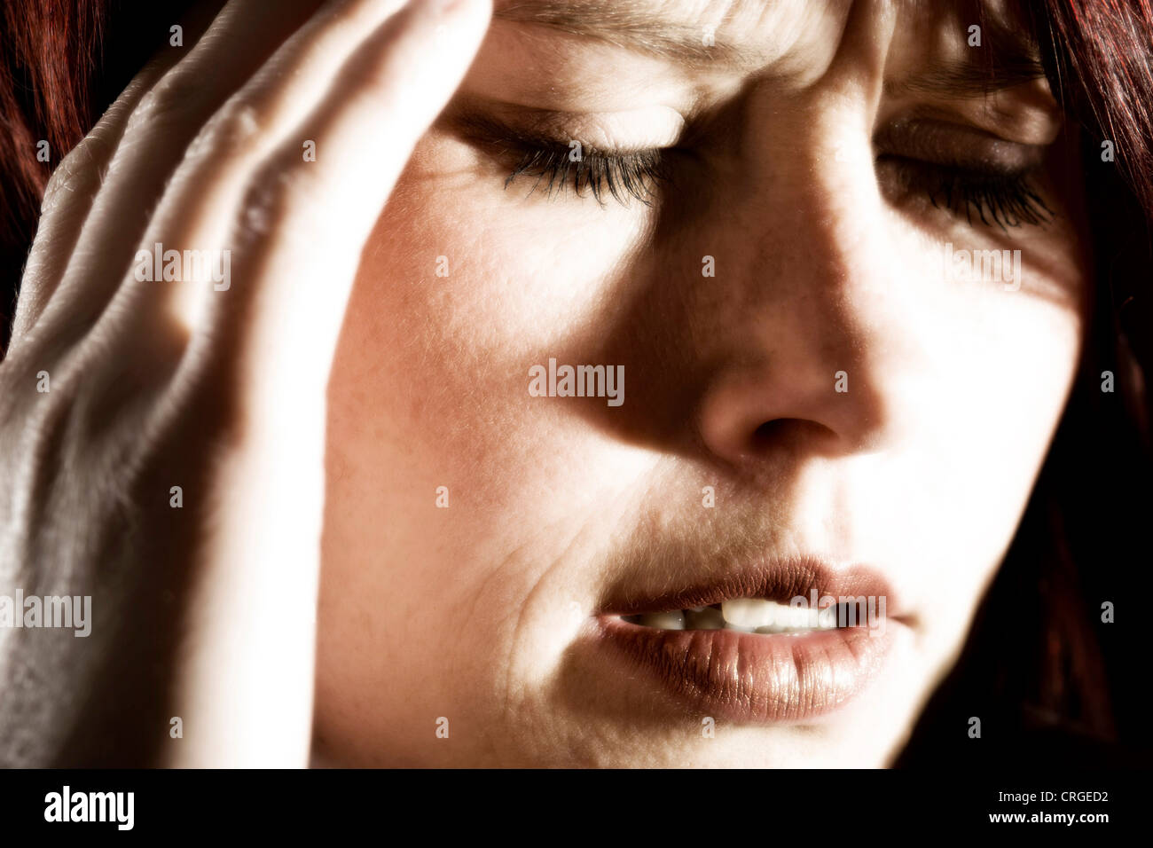 Headache ache aching hands on head hi-res stock photography and images ...