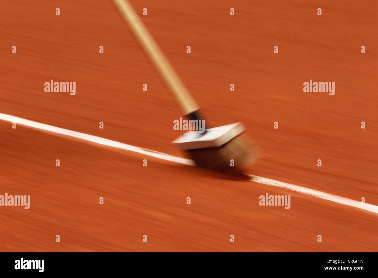Line on clay court is swiped with a broom Stock Photo - Alamy