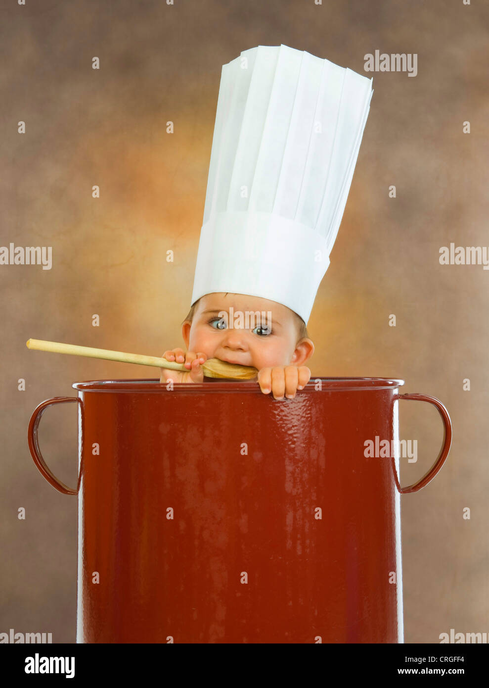 little child with chef's cap in cooking pot Stock Photo - Alamy