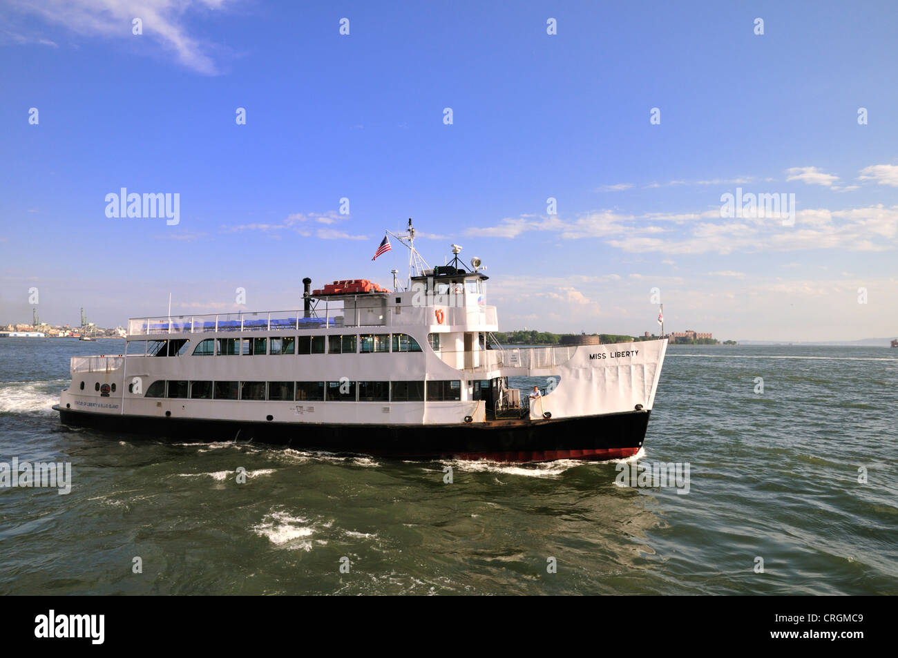 The excursion boat Miss Liberty on its way to the Statue of Liberty and ...