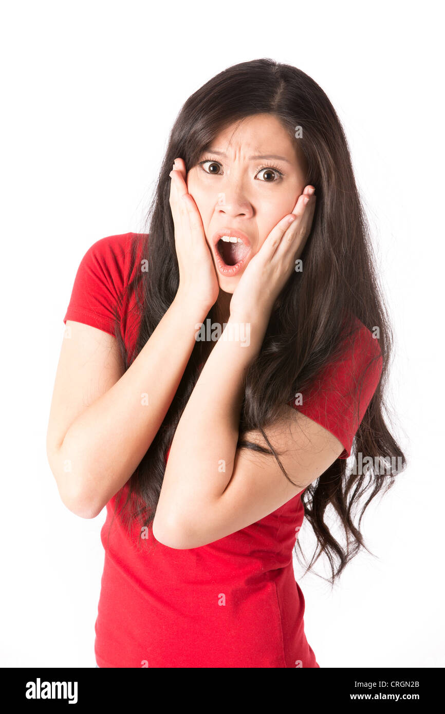 Woman looking shocked Stock Photo - Alamy