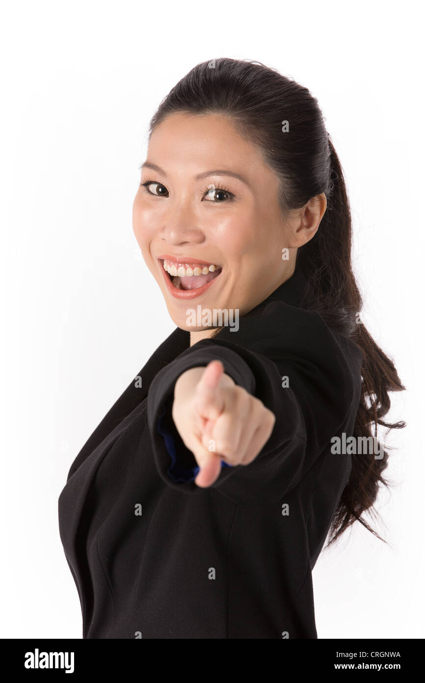 Asian female pointing at camera Stock Photo - Alamy
