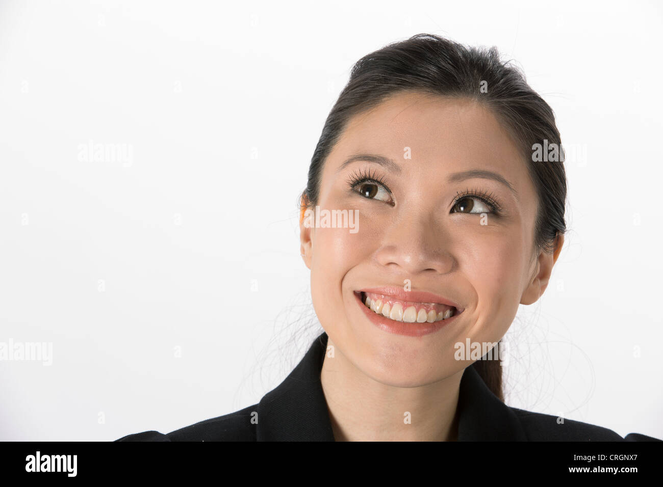 Happy Asian Business woman looking up Stock Photo - Alamy