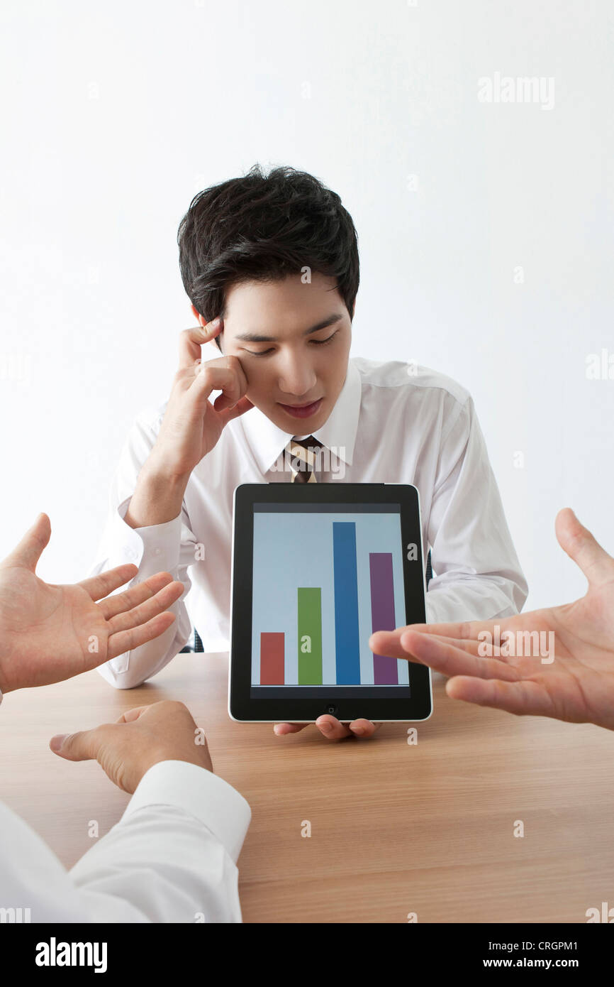 Businessmen working in the meeting room Stock Photo - Alamy