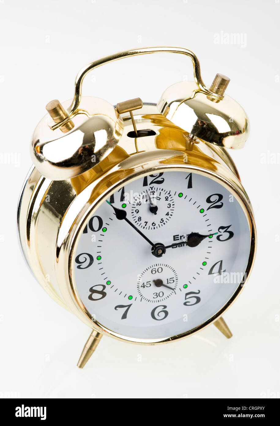 golden alarm clock Stock Photo - Alamy