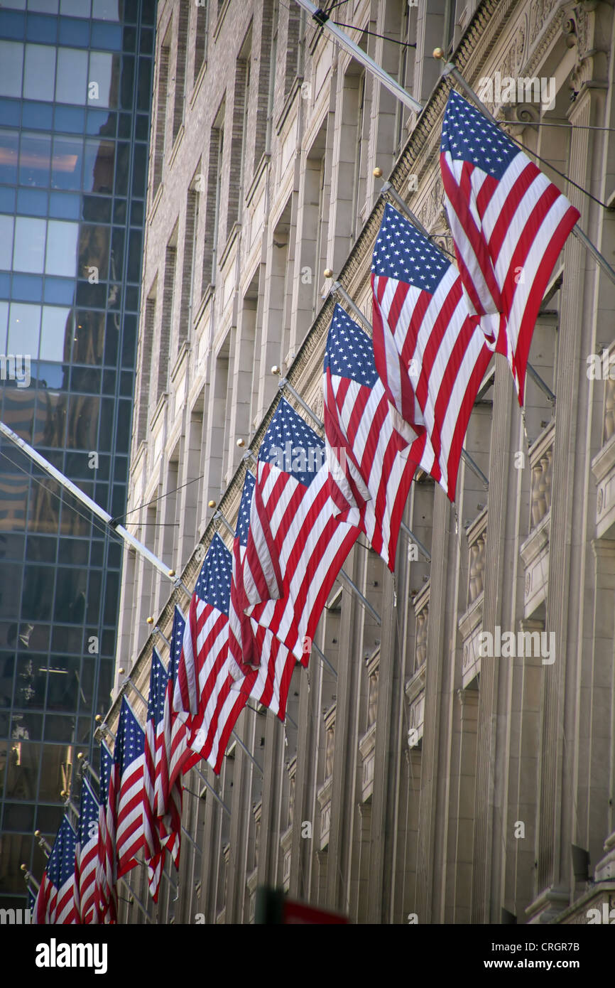Flags in front of a high rise building hi-res stock photography and ...