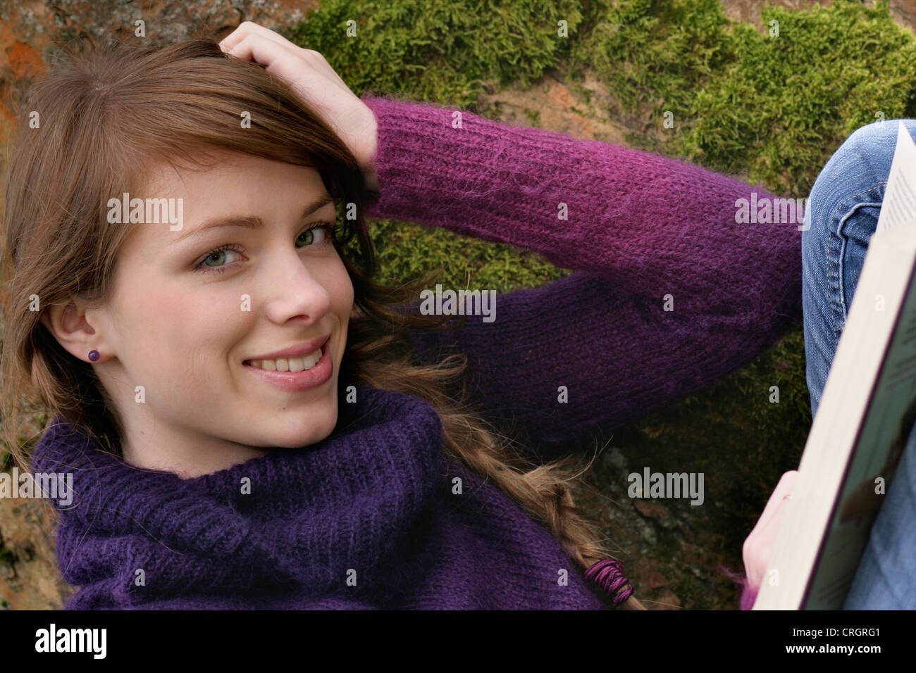 A women leaning against a tree hi-res stock photography and images - Alamy
