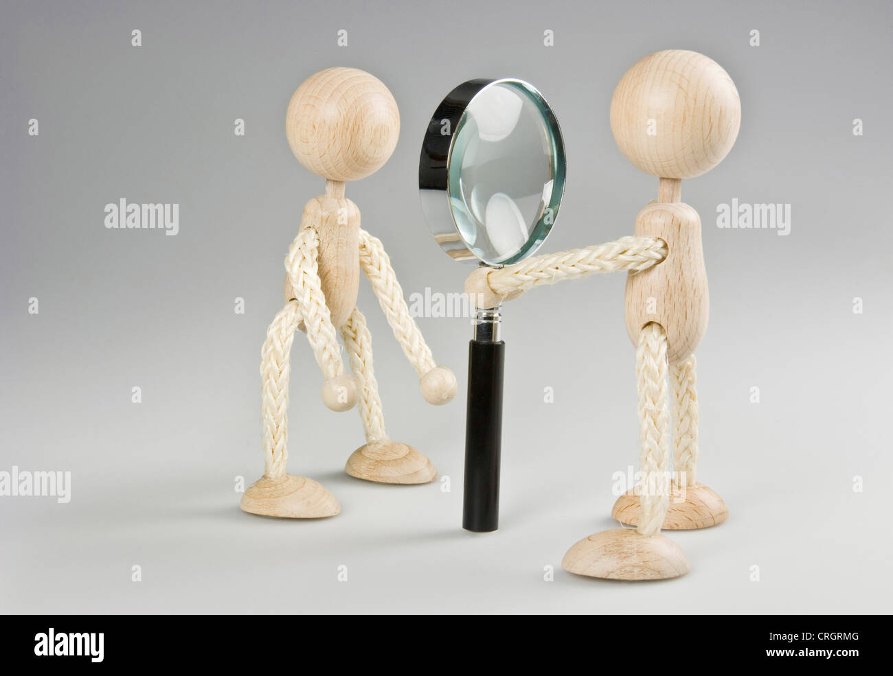 identity check, security check, person is examined by an magnifying ...