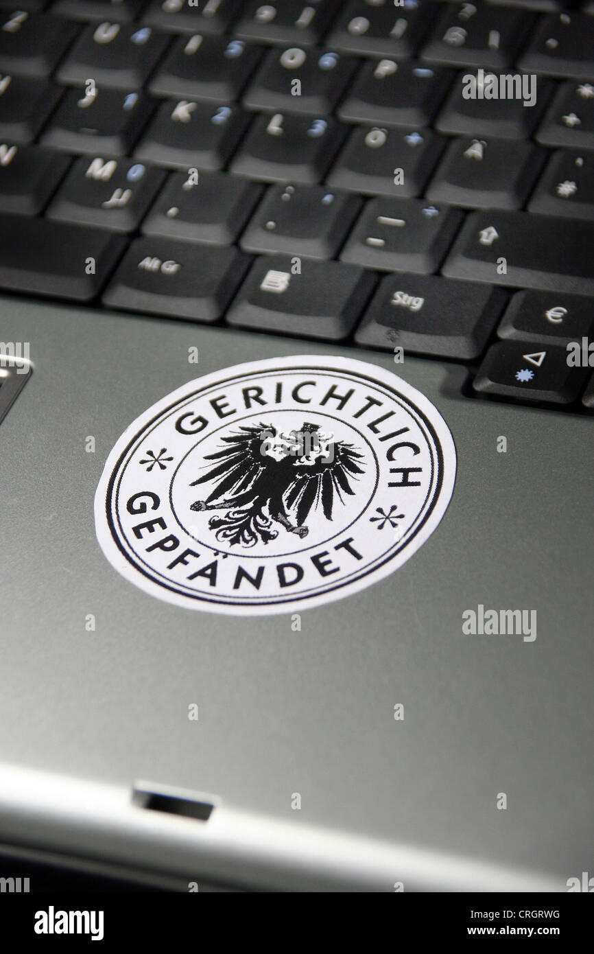 pledge seal on a laptop Stock Photo - Alamy
