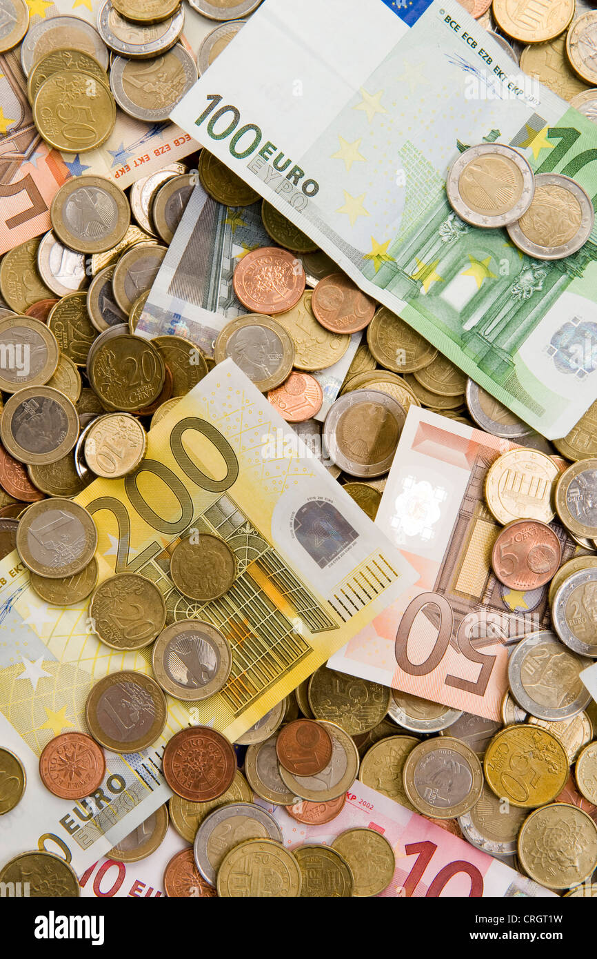 euro banknotes and euro coins Stock Photo - Alamy