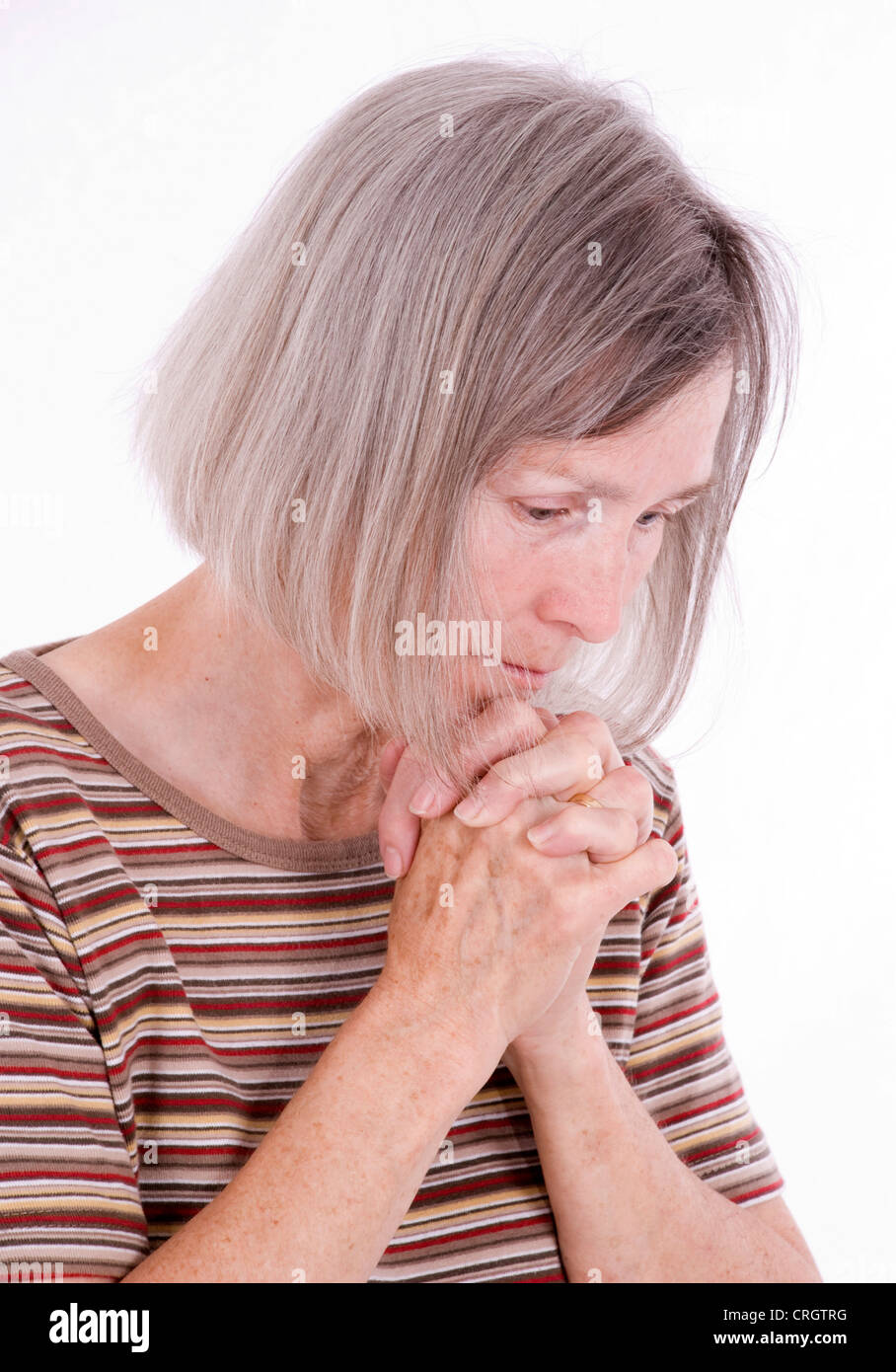 elderly woman praying Stock Photo - Alamy