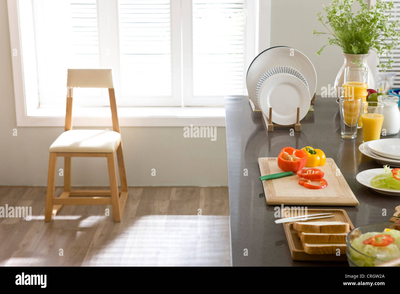 Various vegetables on kitchen counter Stock Photo - Alamy