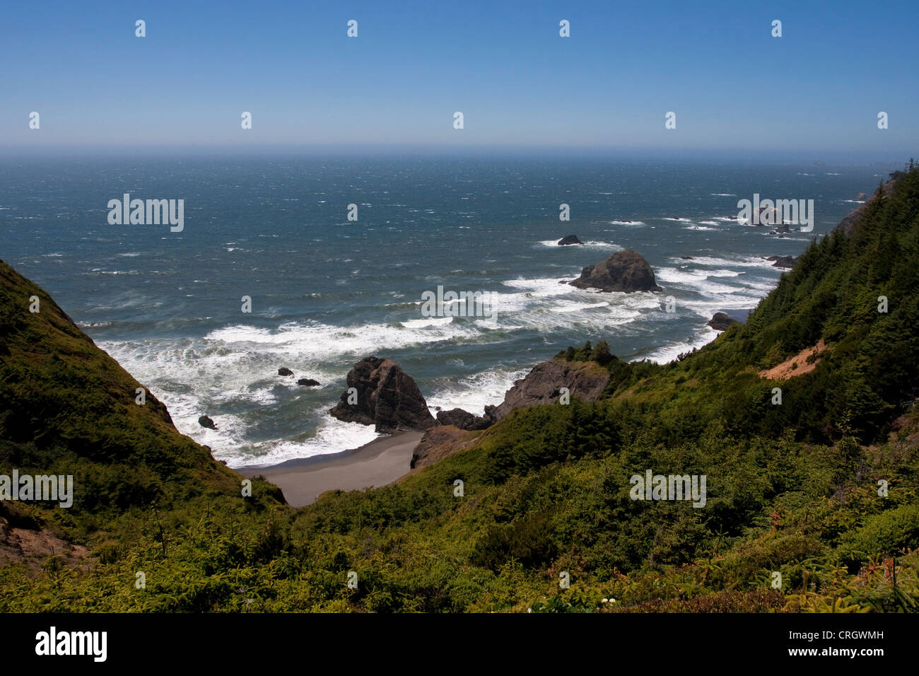 Scenic seascape from cliffs along Oregon Coast in July showing outcrop ...