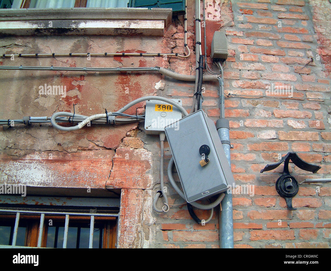 power supply line on the wall Stock Photo - Alamy