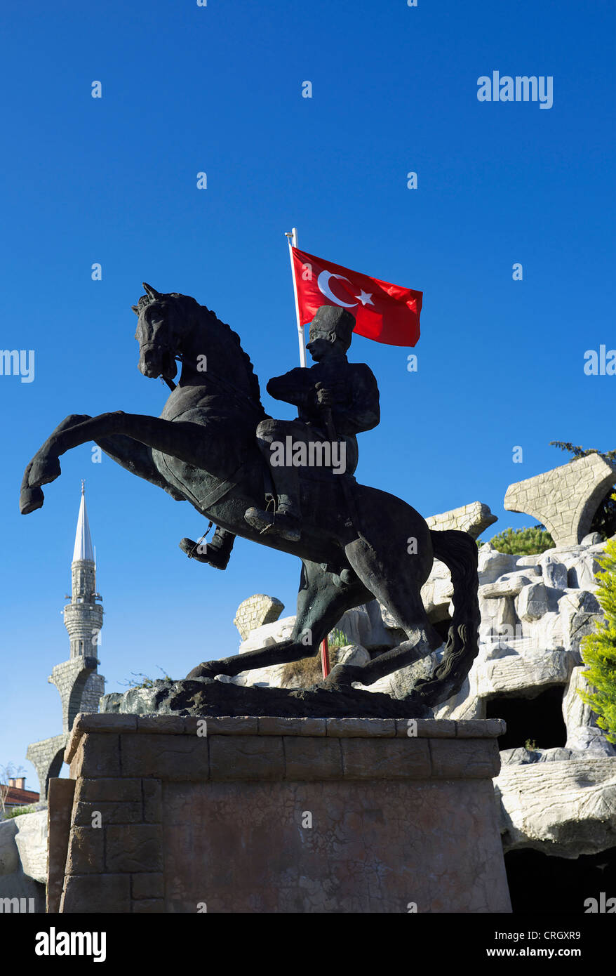 Statue of Ataturk on a horseback with the Turkish flag, in the town ...