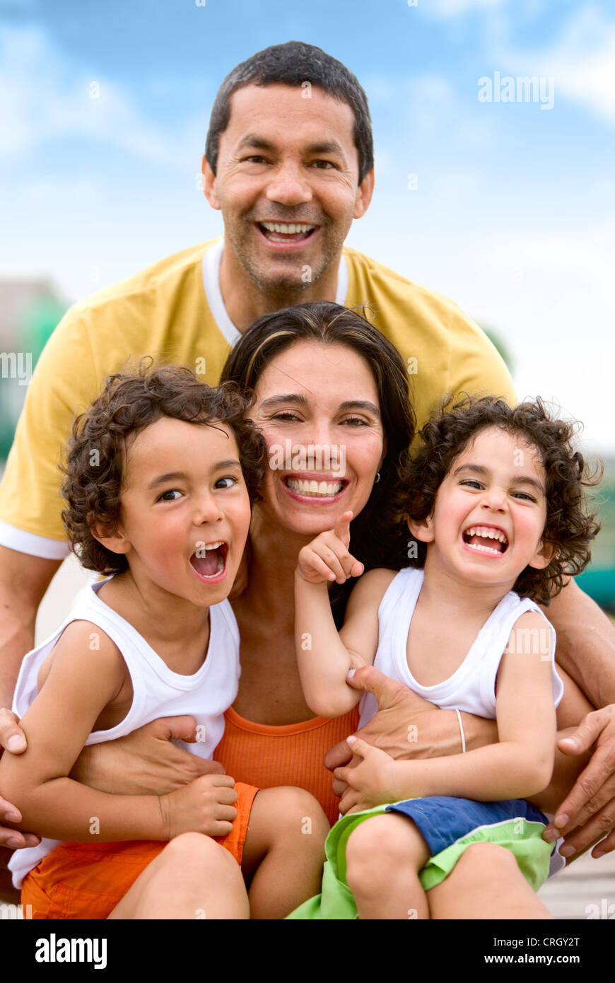 family portrait, happy parents with two little boys Stock Photo - Alamy
