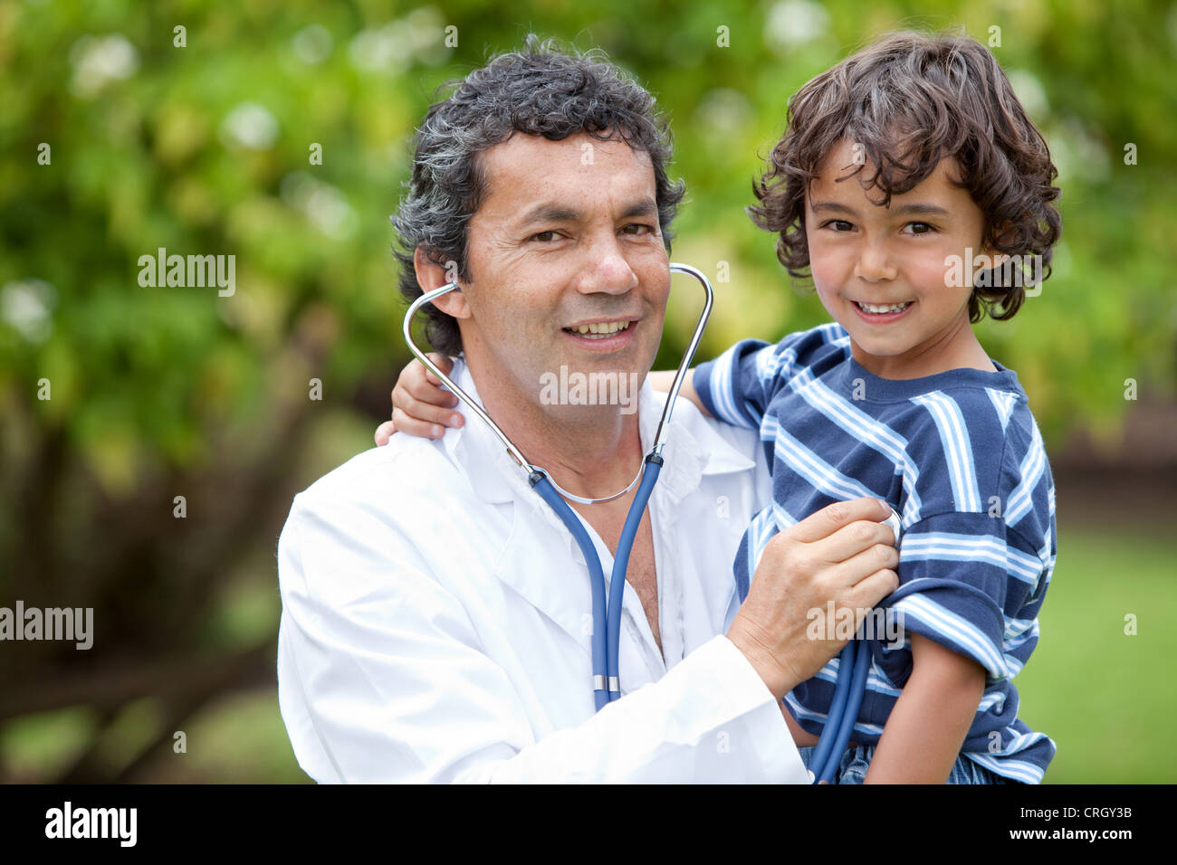 Pediatricians checking health children hi-res stock photography and ...