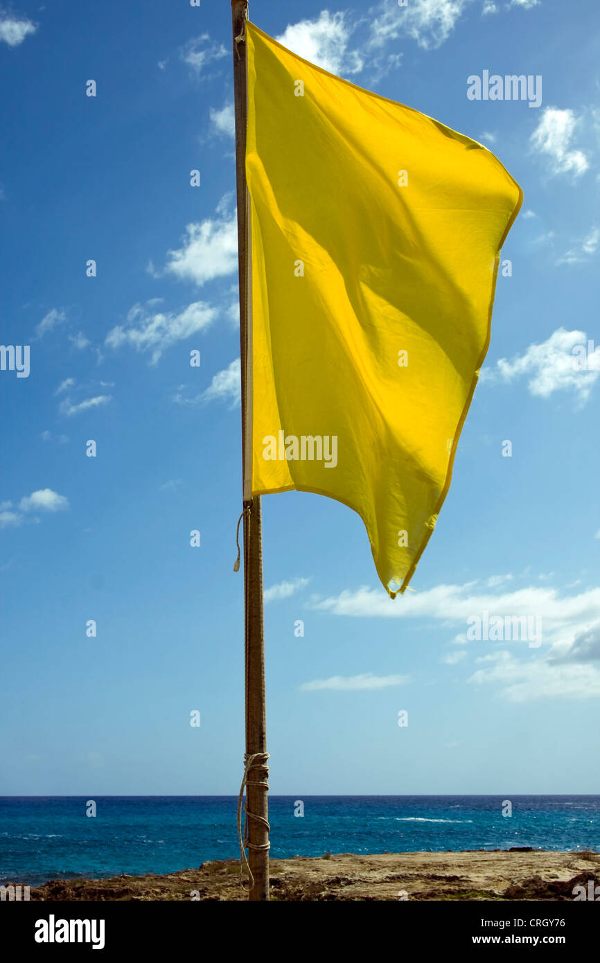 Yellow Caution Flag Stock Photo - Alamy
