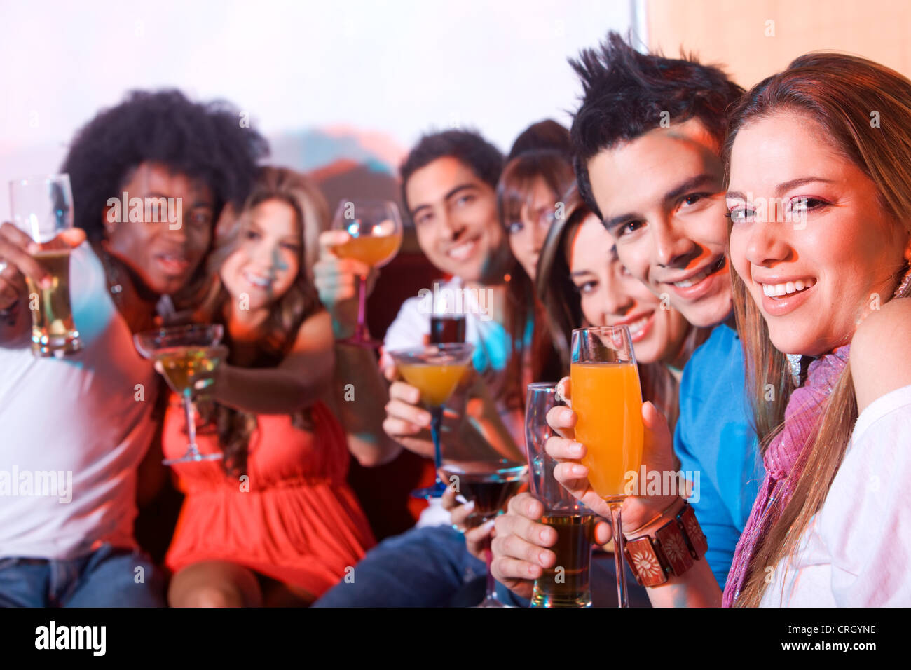 group of happy friends smiling in a bar or a nightclub Stock Photo - Alamy
