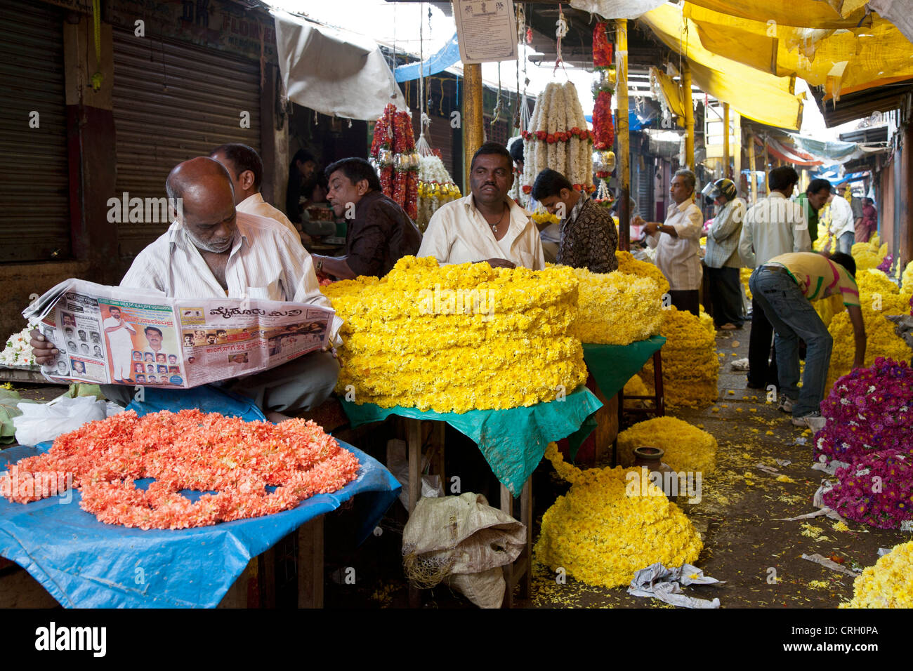 Flower necklaces vendors. Devaraja market. Mysore. India Stock Photo ...