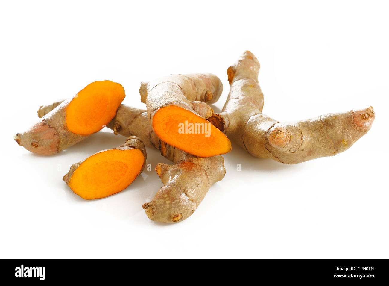 Turmeric root on white background Stock Photo - Alamy