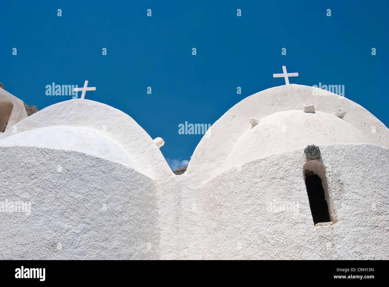 The Twin Domes of a medieval Greek Chapel in Santorini Greece Stock ...