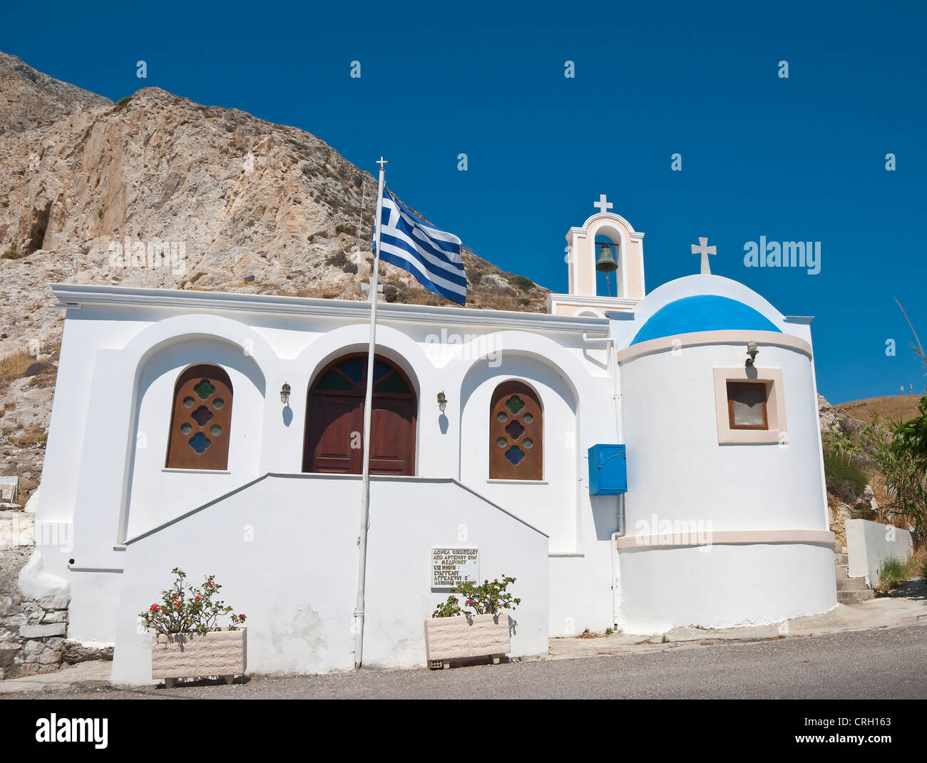 A Small Greek Orthodox Church and Bell Tower with Greek Flag Flying ...