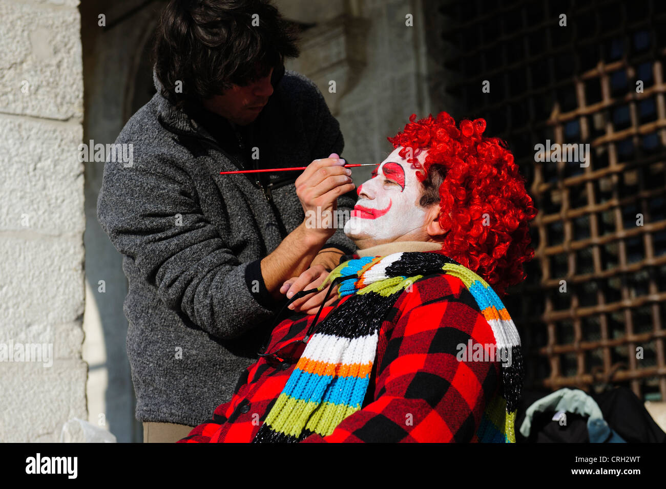 A clown being made up before a performance for the Carnival of Venice ...