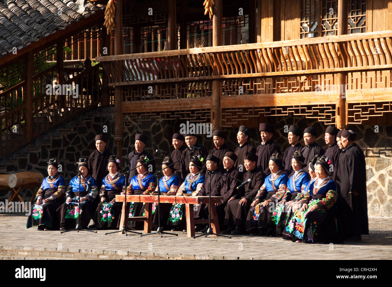 A group of elderly Miao people singing traditional songs, Xijiang Miao ...