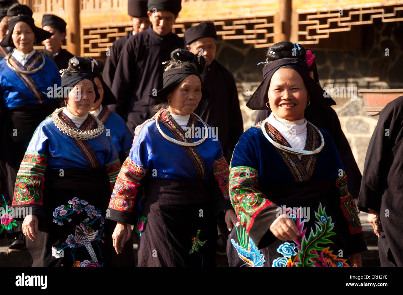 A group of elderly Miao people after having performed traditional songs ...