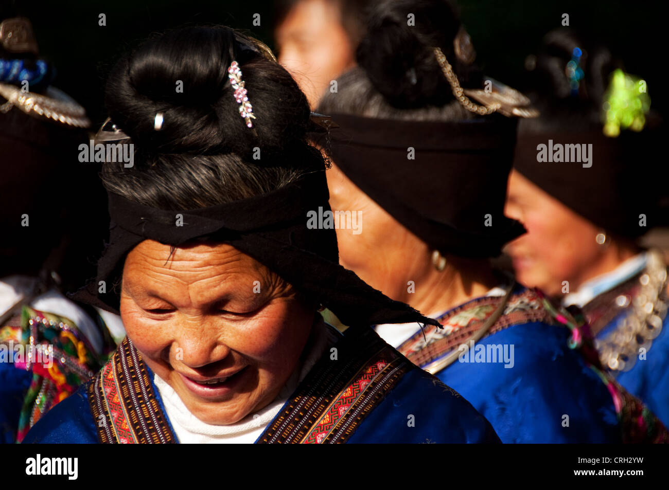 Miao elderly woman while performing traditional songs, Xijiang Miao ...