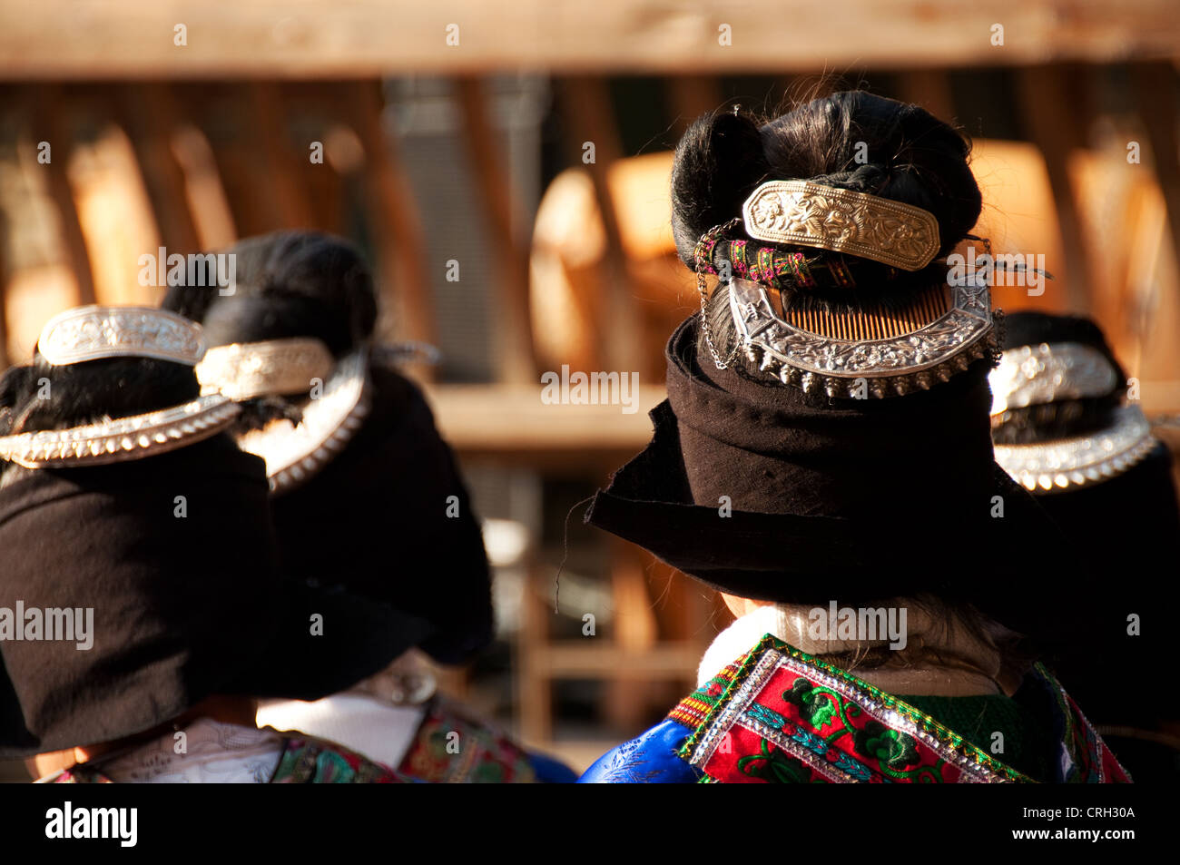 Traditional Miao woman hairstyle with silver jewels and combs, Xijiang ...
