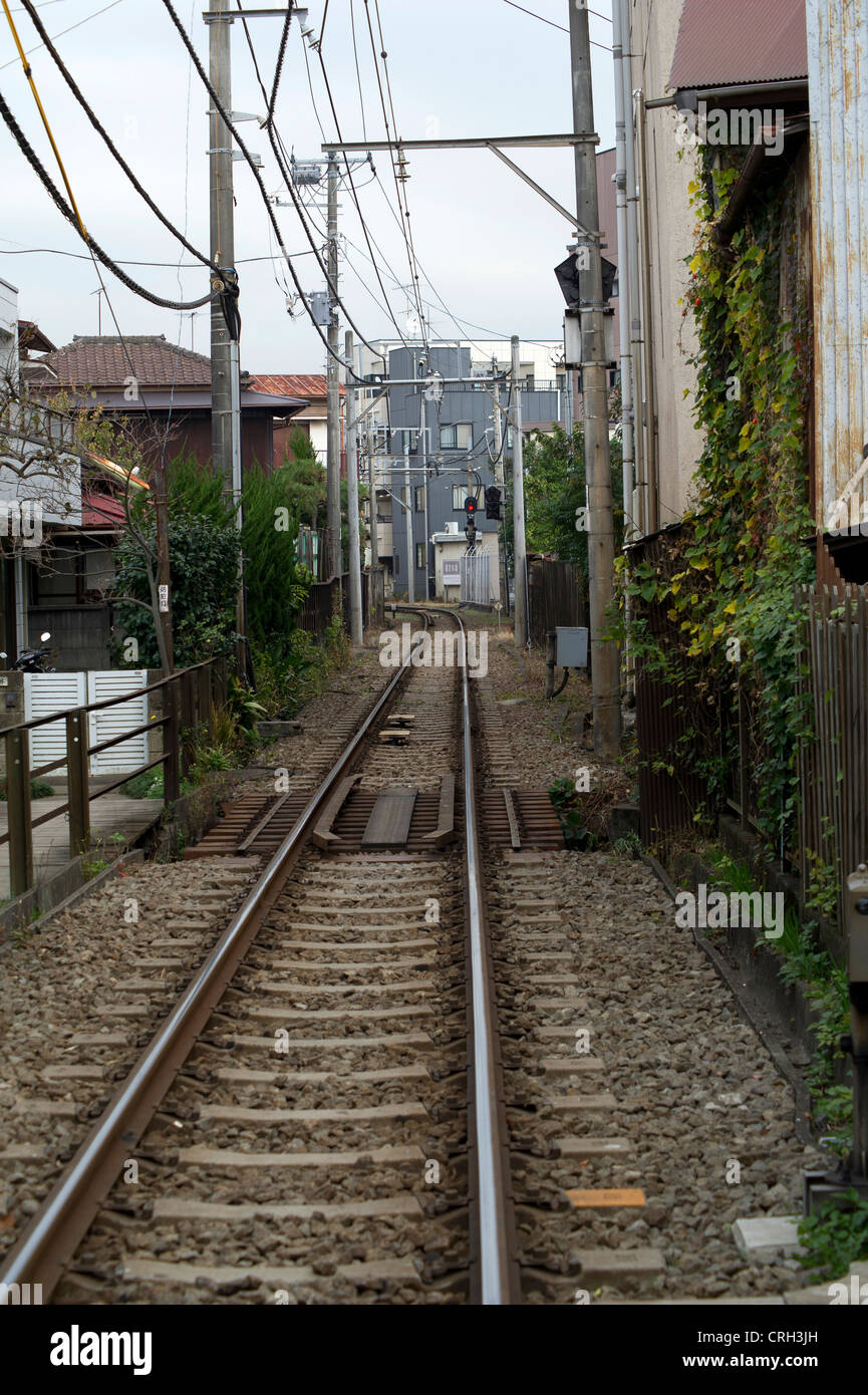 Railway tracks on a street in Kamakura Stock Photo - Alamy