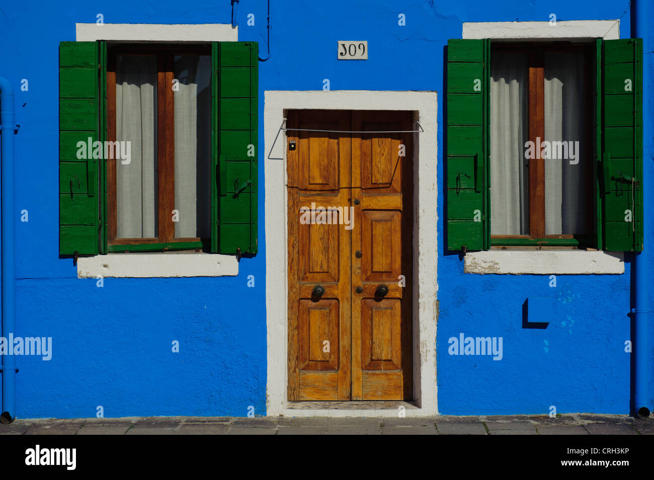 Blue painted house facade in Burano Island, Venice, Veneto, Italy Stock ...