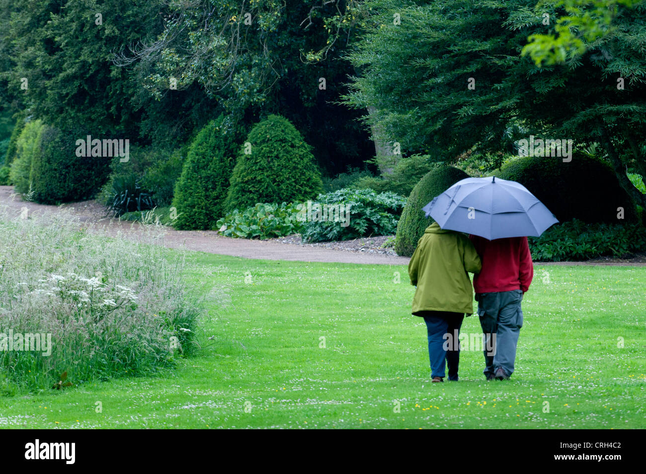 Walk in rain umbrella hi-res stock photography and images - Alamy
