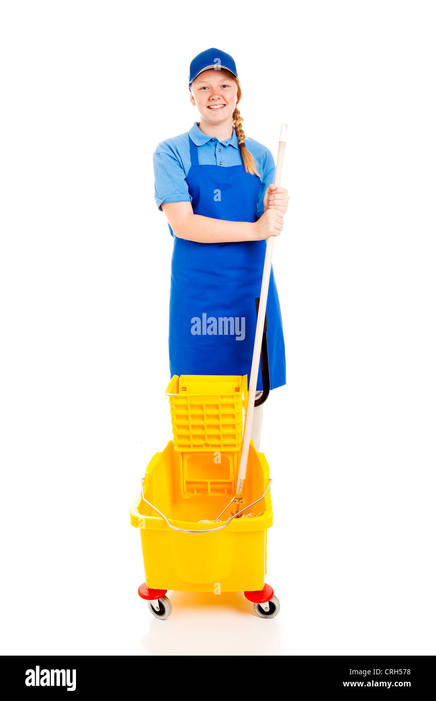 Friendly, smiling teenage girl in a uniform, with a mop and bucket ...