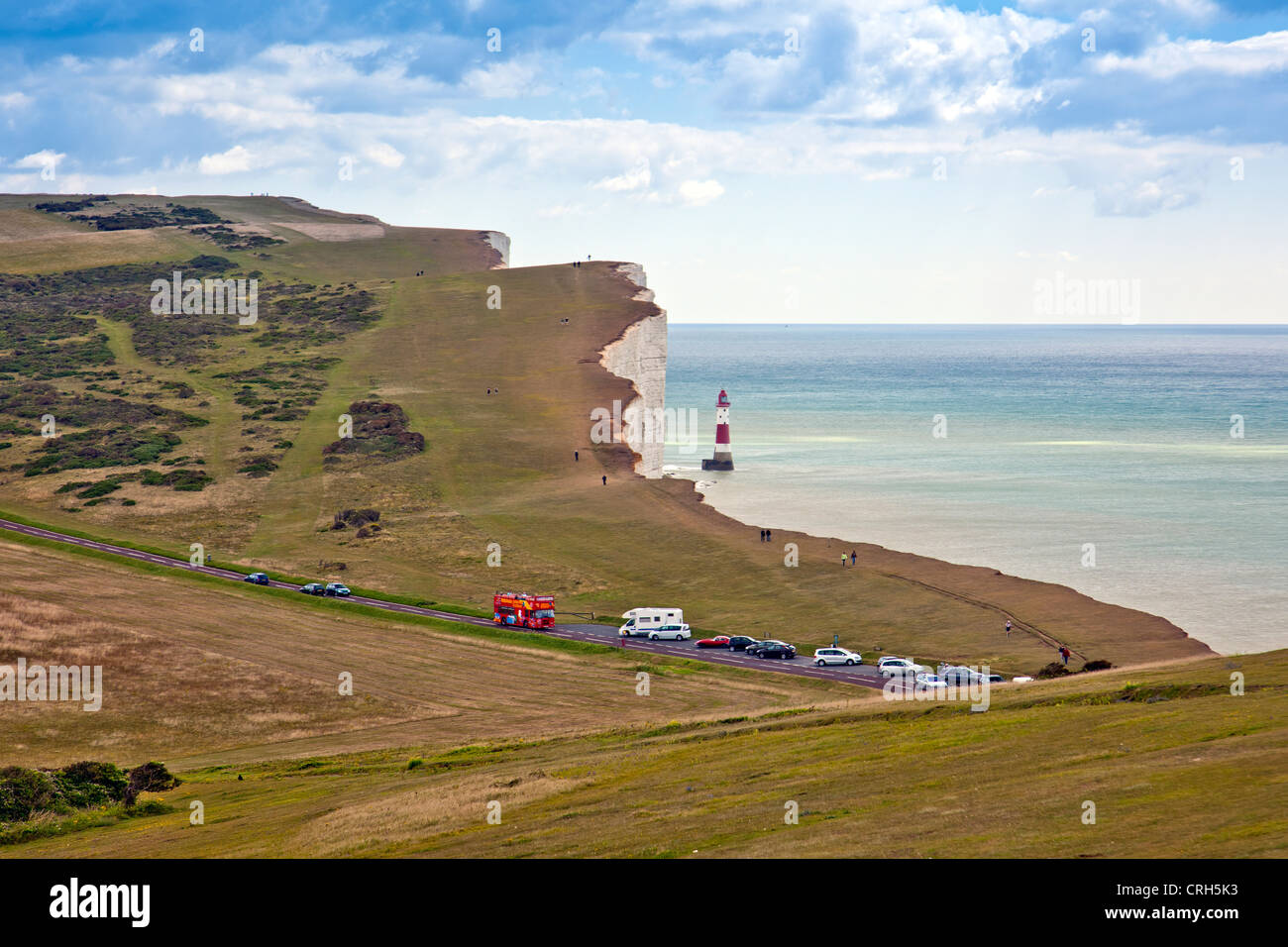 Open topped bus passing the present Beachy Head lighthouse car park and ...