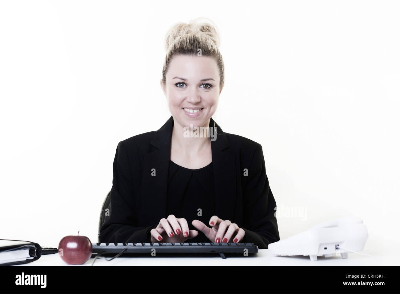 businesswoman working very hard at hes desk Stock Photo - Alamy