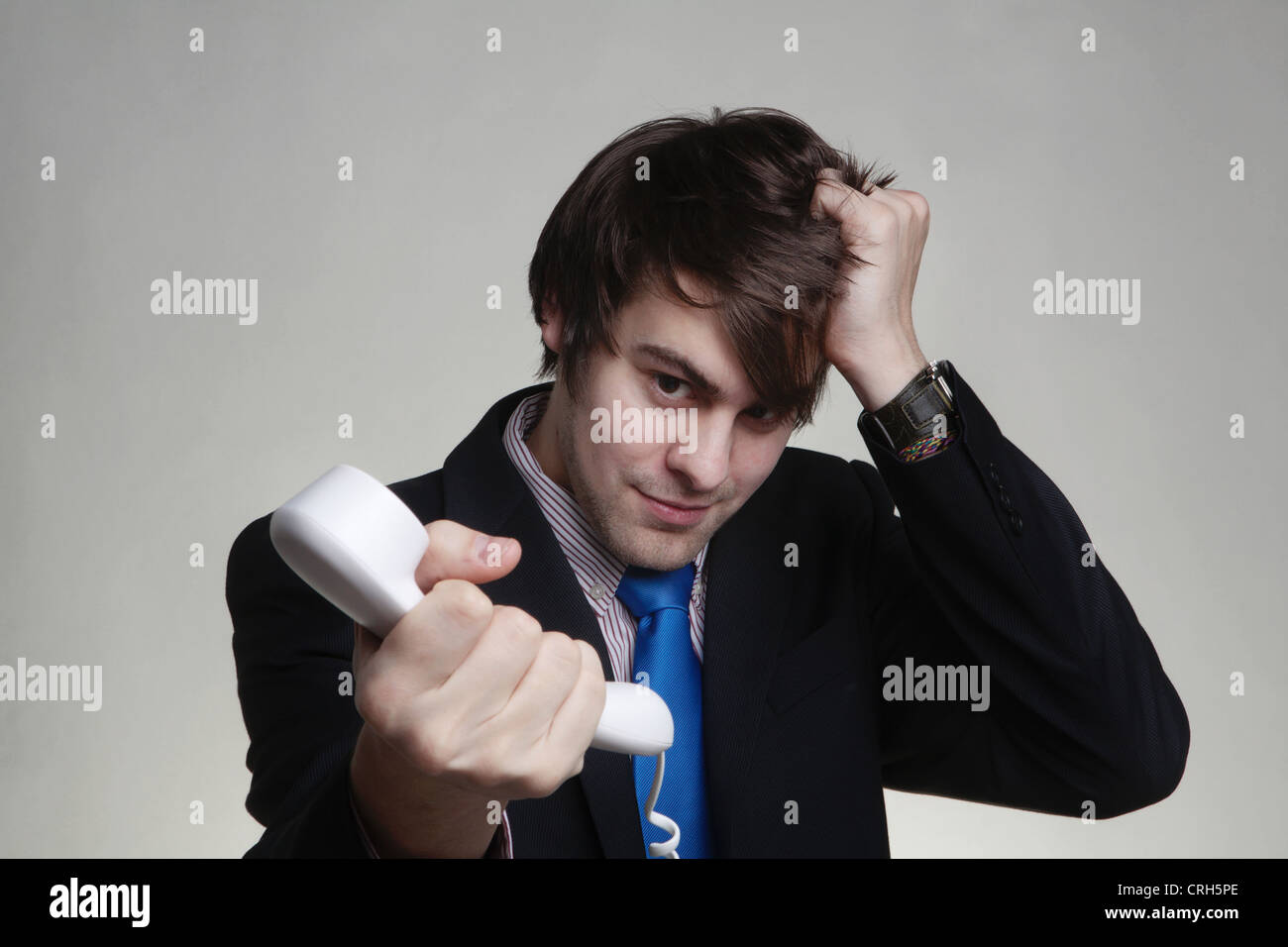 Office worker scratching head hi-res stock photography and images - Alamy