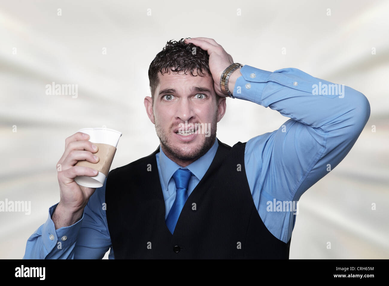 stress out business man pulling at his hair and squashing a paper ...