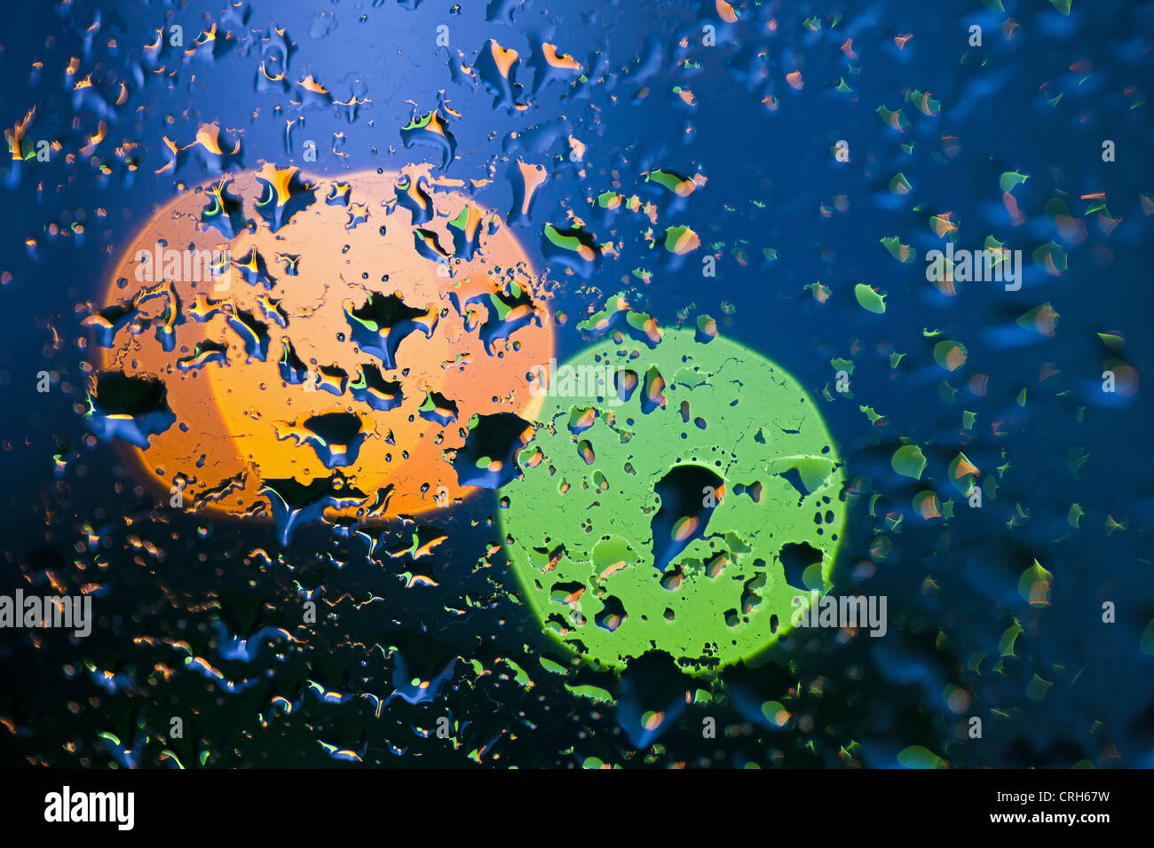Beautiful abstract colorful background with water drops over window ...