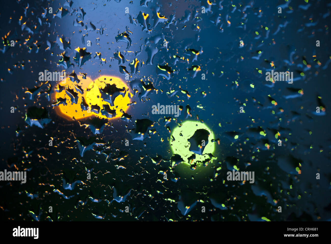 Beautiful abstract colorful background with water drops over window ...